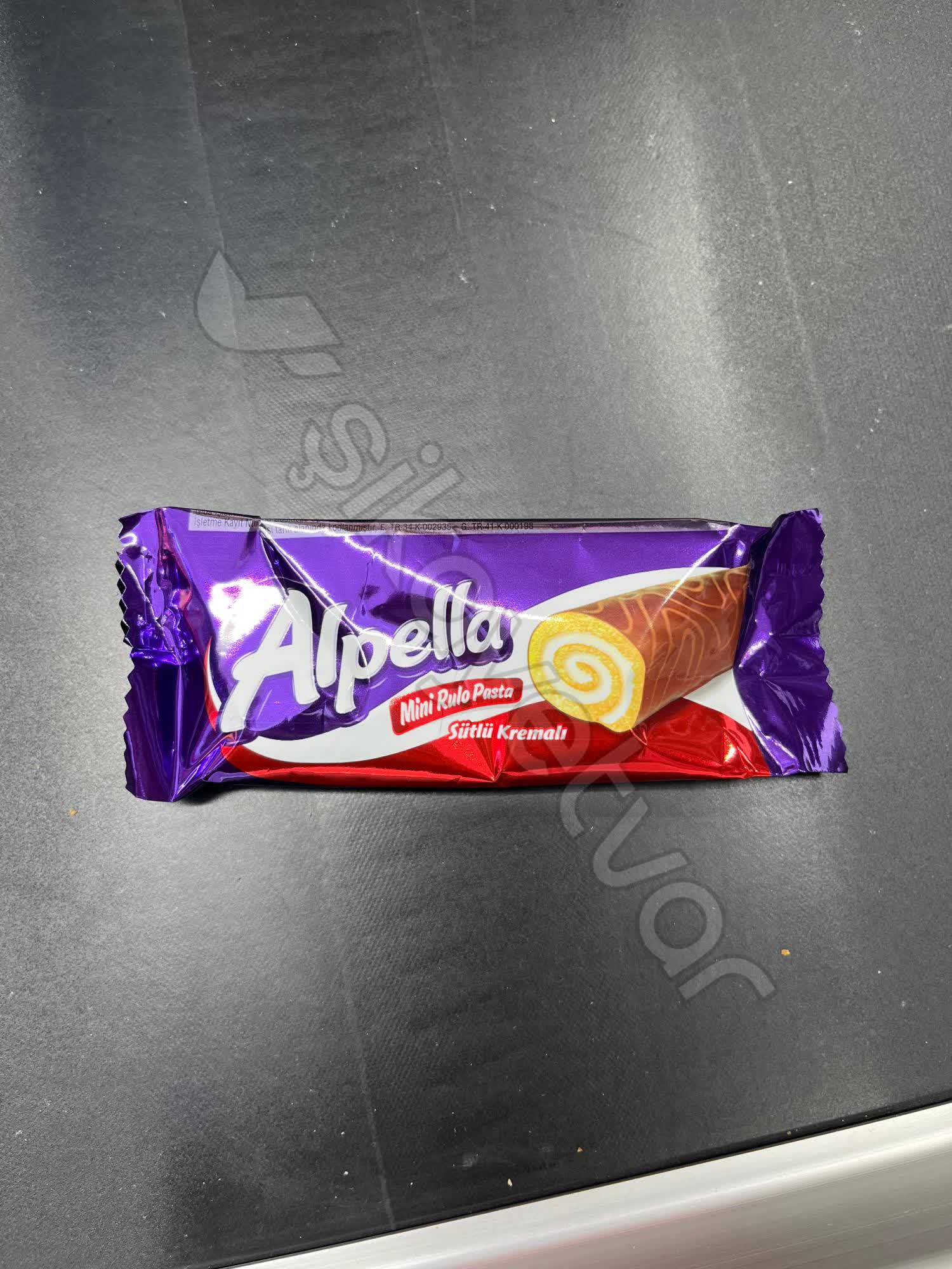 Alpella Logo Ulker Alpella White Chocolate Coated Cake With Cocoa