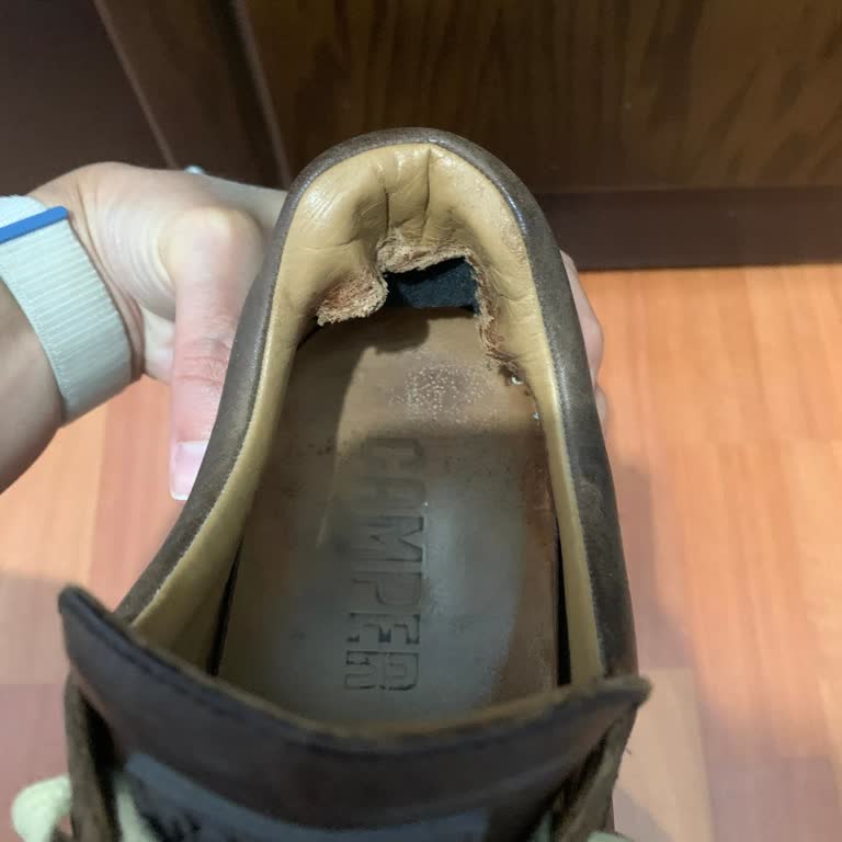 Camper Denied Defect in Shoes Despite Visible Damage - Xolvie