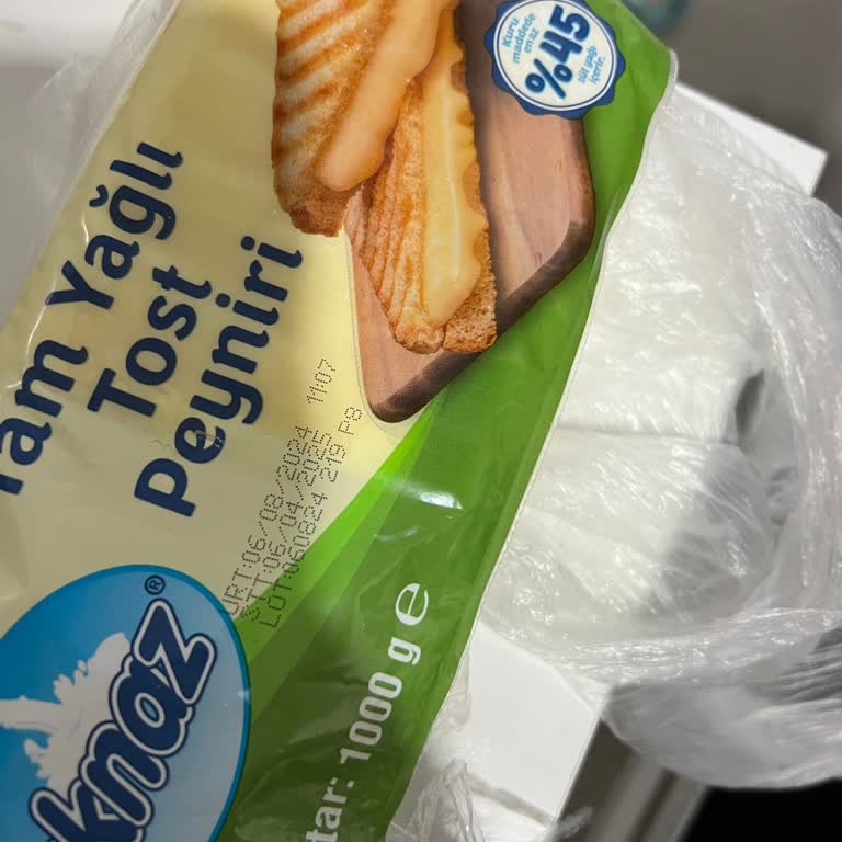 BİM Aknaz Tam Yağlı Tost Peynirinin İçinden Kıl Dönmesi - Şikayetvar