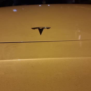 Tesla Model Y Delivered With Defective Hood and Misaligned Panels - Xolvie